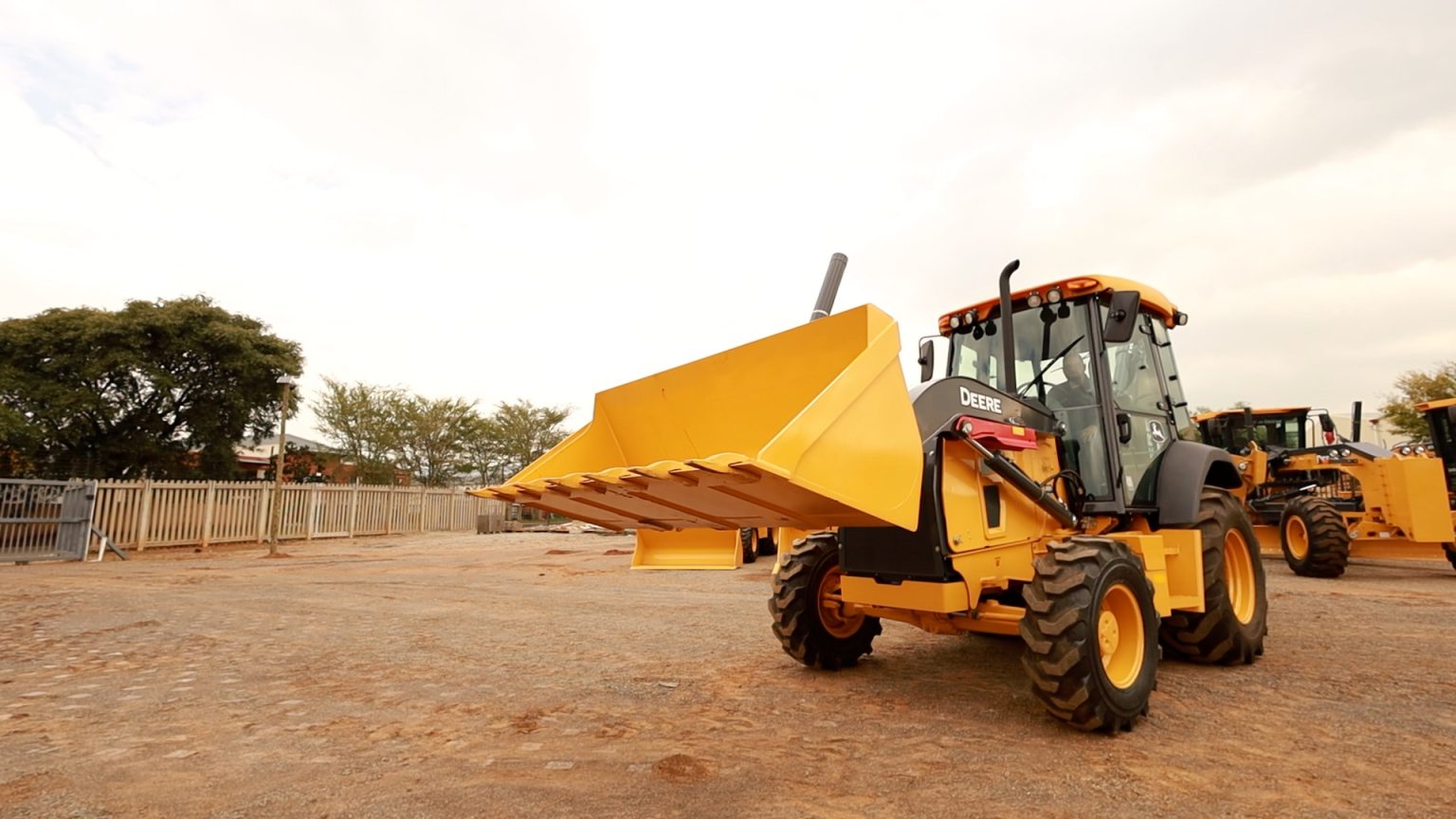The John Deere 310L & 315 SL Tractor Loader Backhoe